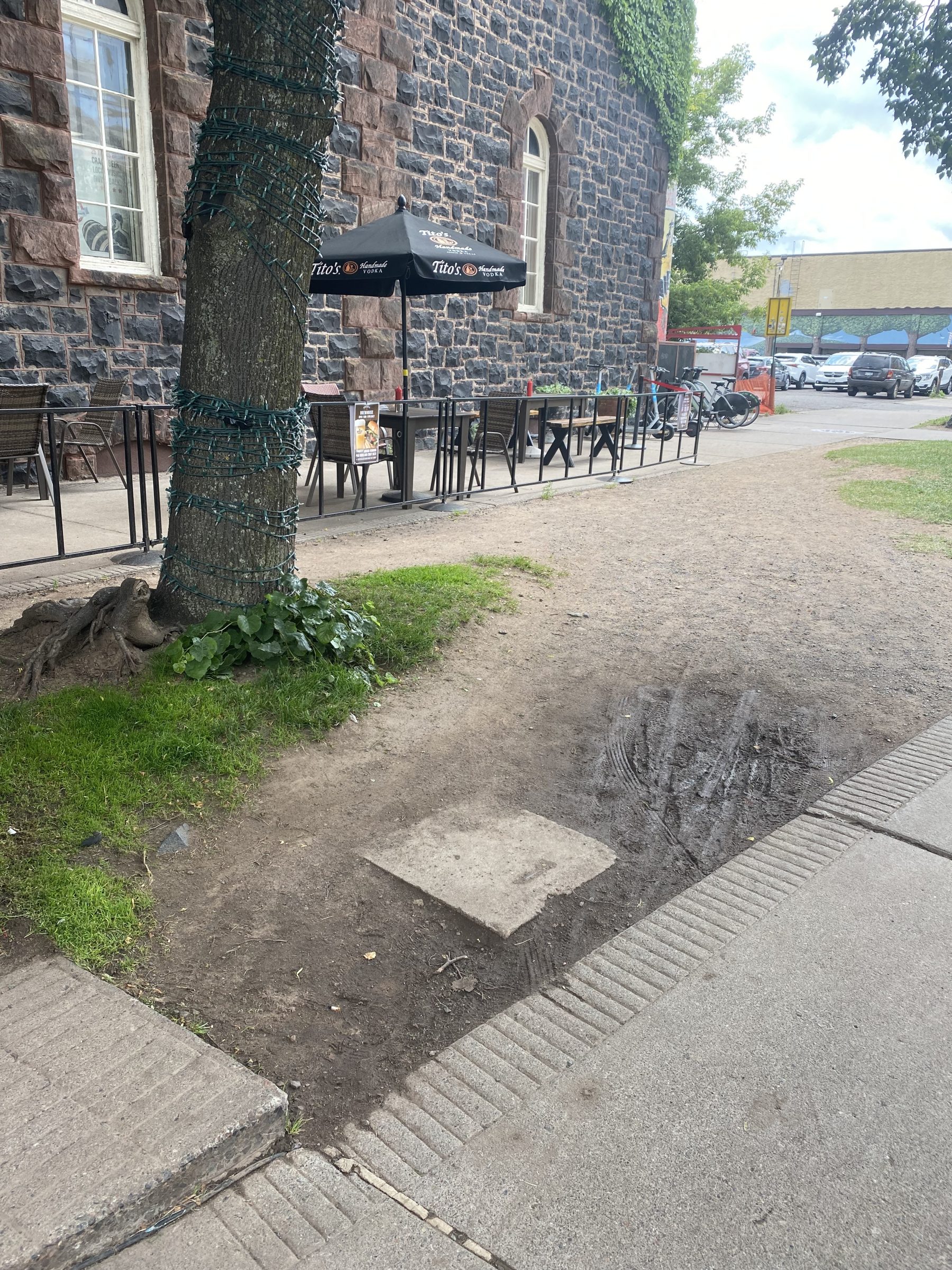 A Questionably Repaired Duluth Sidewalk - Streets.mn