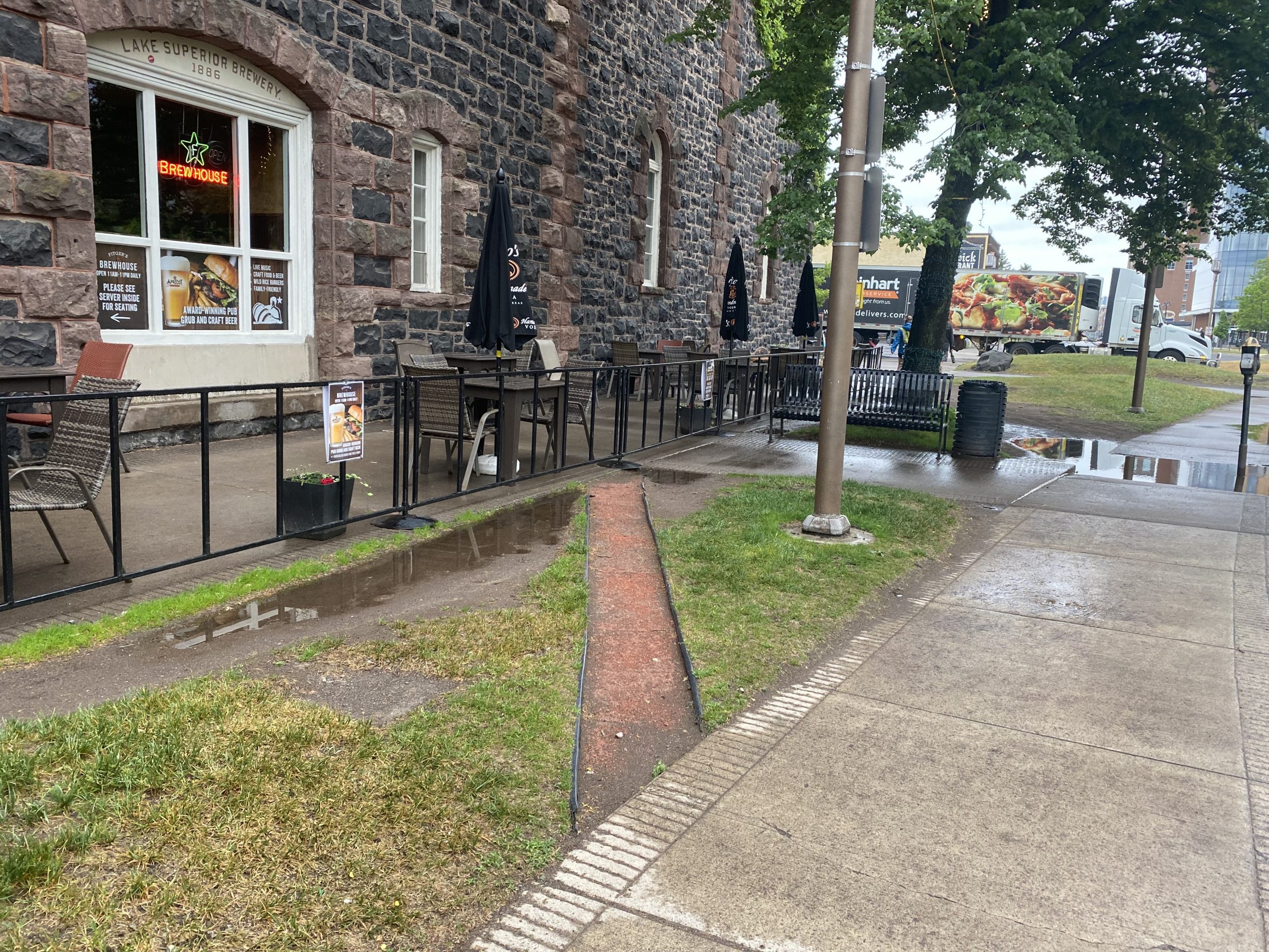 A Questionably Repaired Duluth Sidewalk - Streets.mn